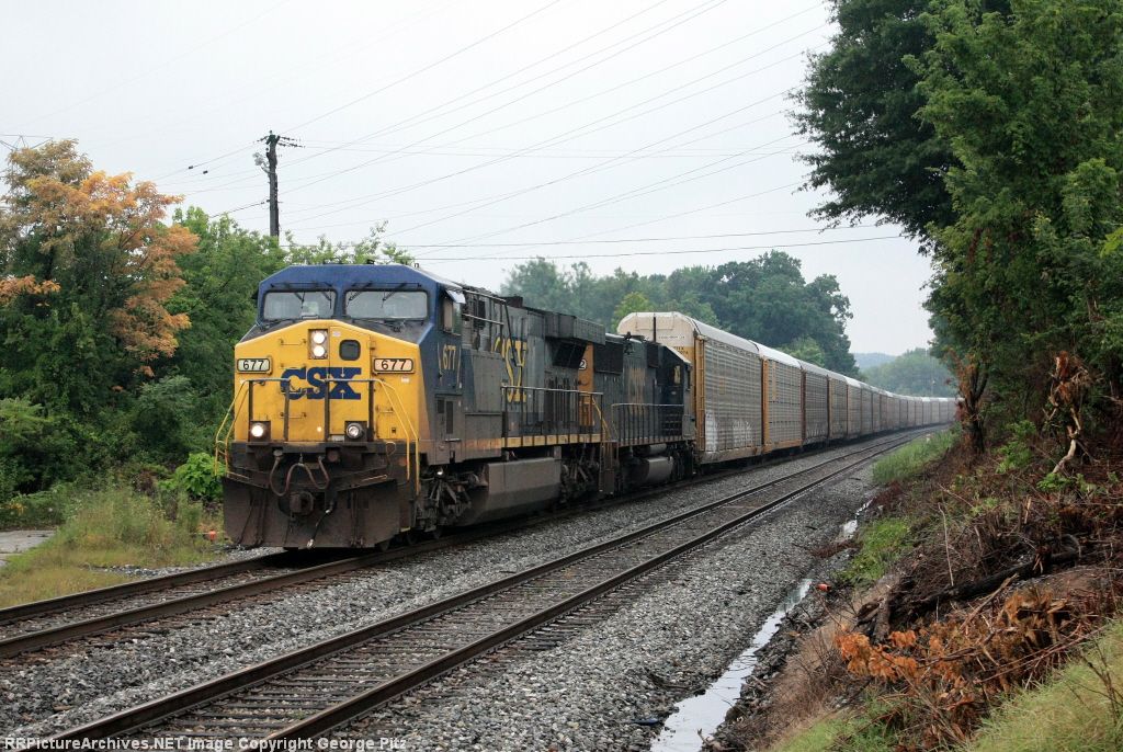 CSX 677 and train Q216